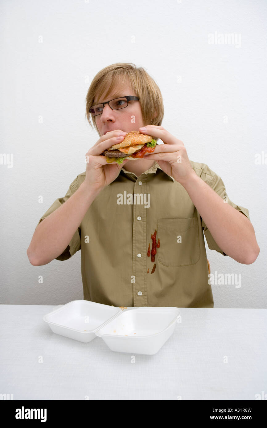 Man spilling burger hi-res stock photography and images - Alamy