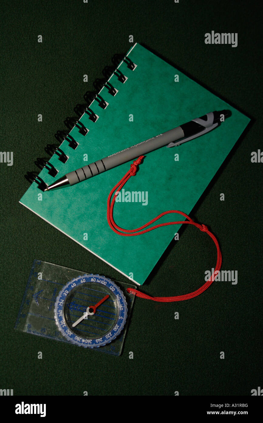 Compass, Notebook and Pen Stock Photo - Alamy