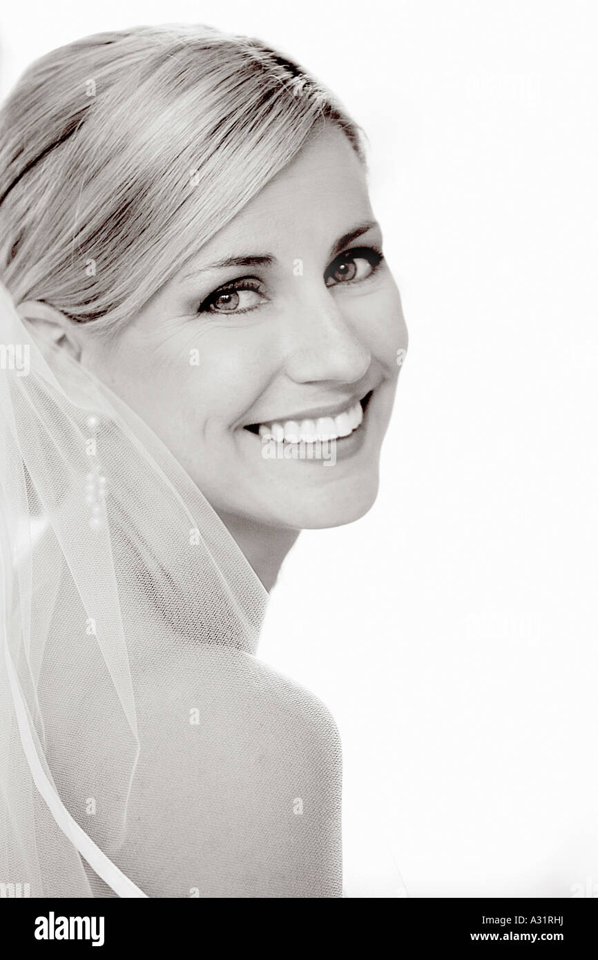 Portrait of a bride looking over her shoulder Stock Photo - Alamy