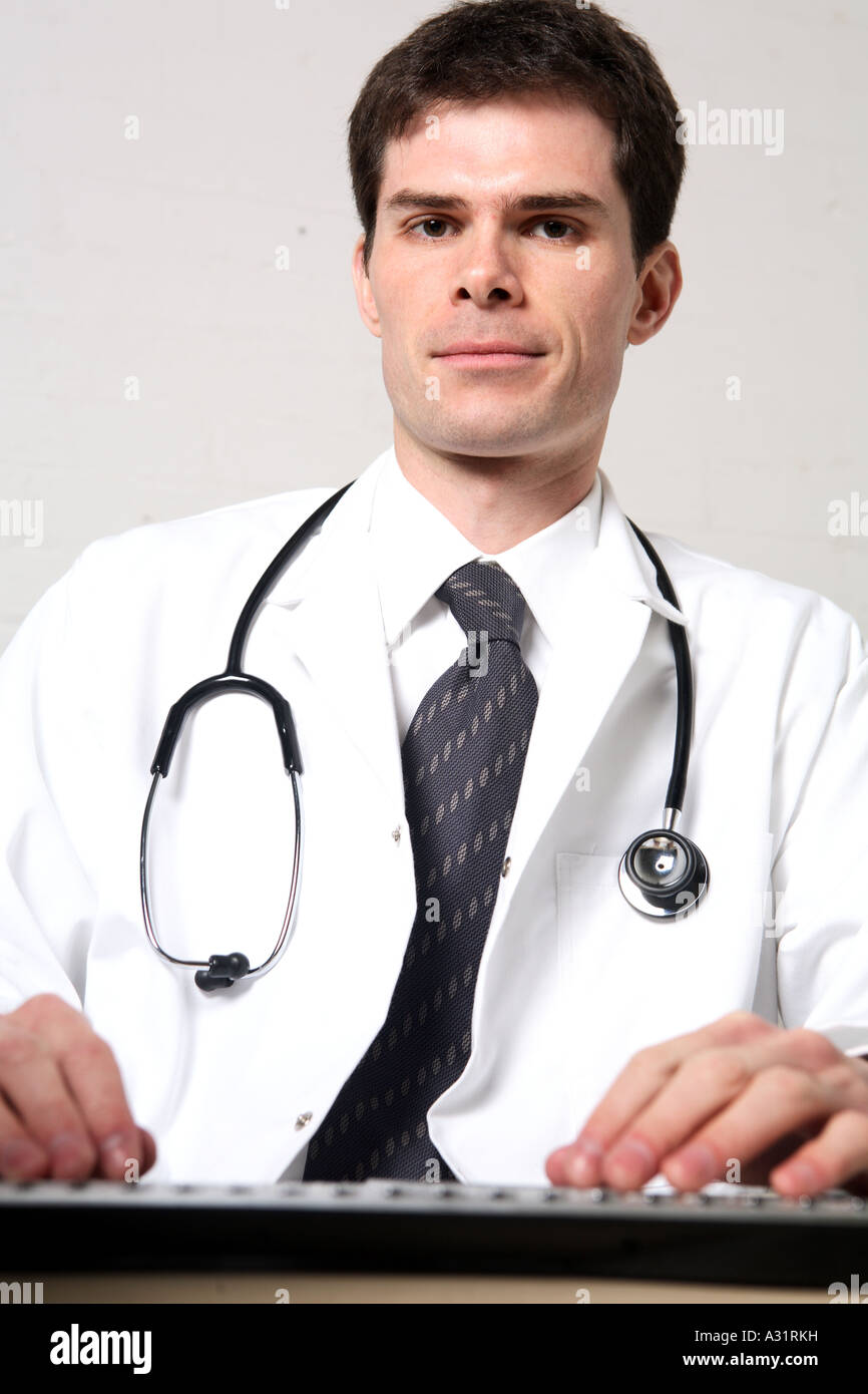 Doctor using keyboard Stock Photo - Alamy