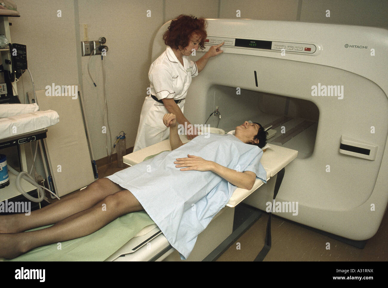 woman having a body scan in hospital Stock Photo - Alamy
