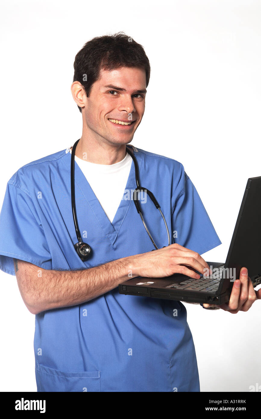 Surgeon using laptop computer Stock Photo - Alamy