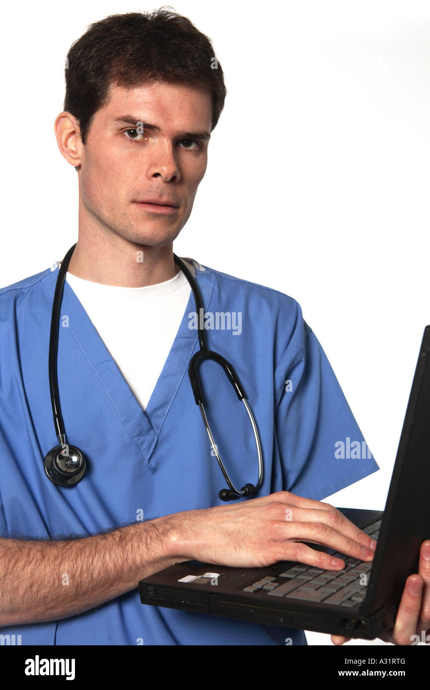 Surgeon using laptop Stock Photo - Alamy