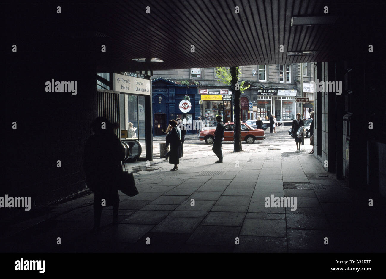 person walking through a subway crossing Stock Photo - Alamy
