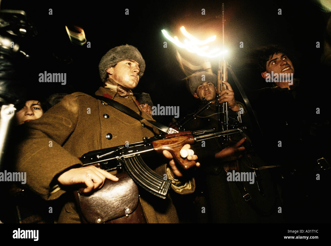 romania after the revolution soldiers armed with kalashnikov machine ...