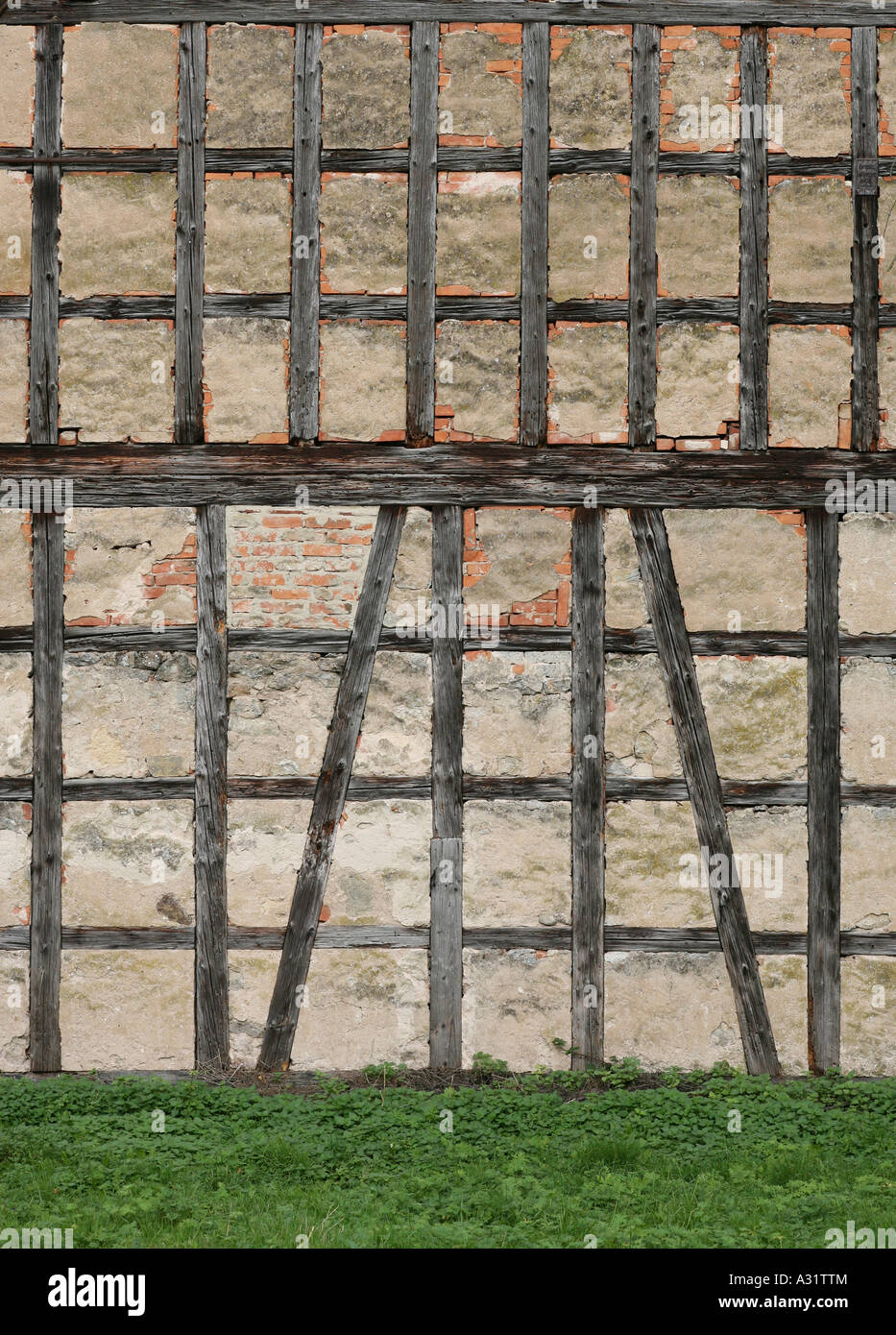 Side wall of old building with wooden beams Stock Photo - Alamy