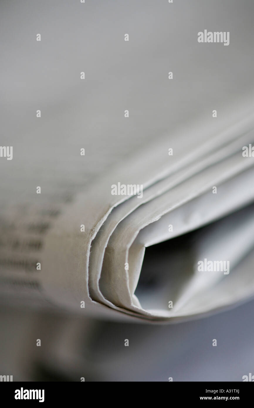Close up of a folded newspaper Stock Photo - Alamy