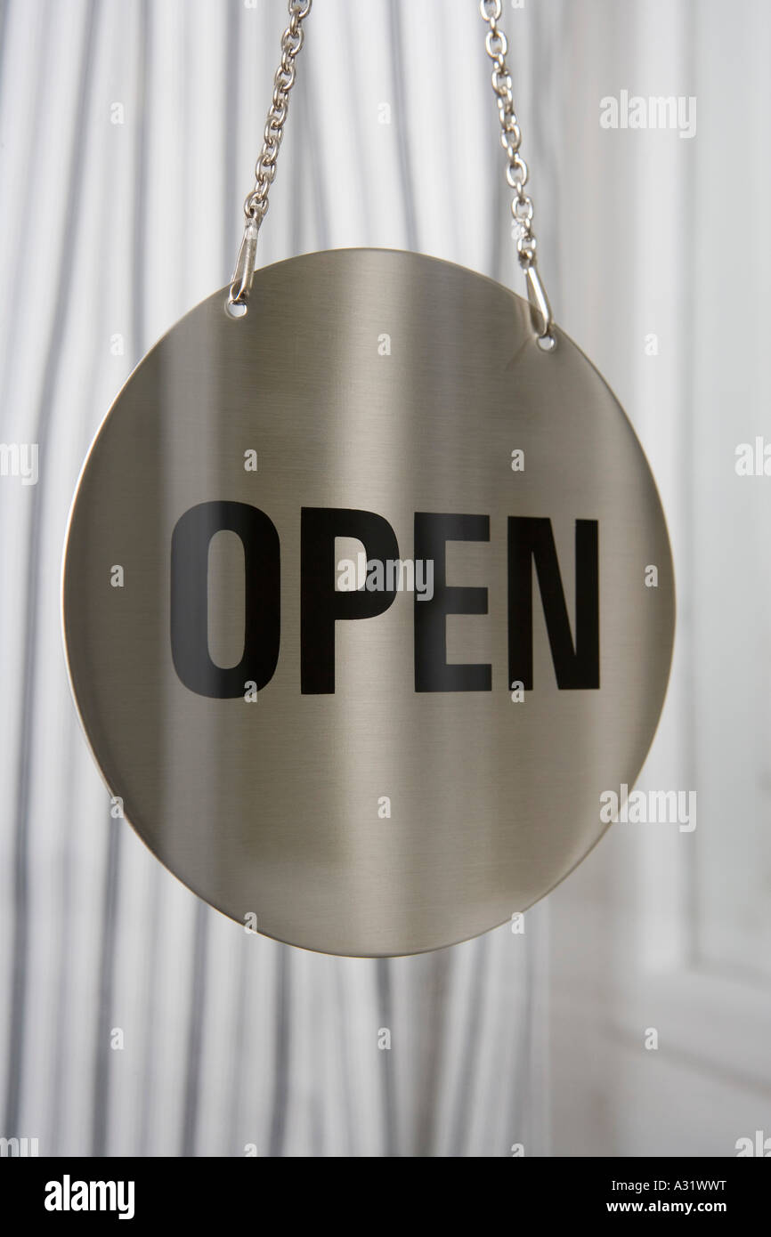 Open sign in window Stock Photo - Alamy