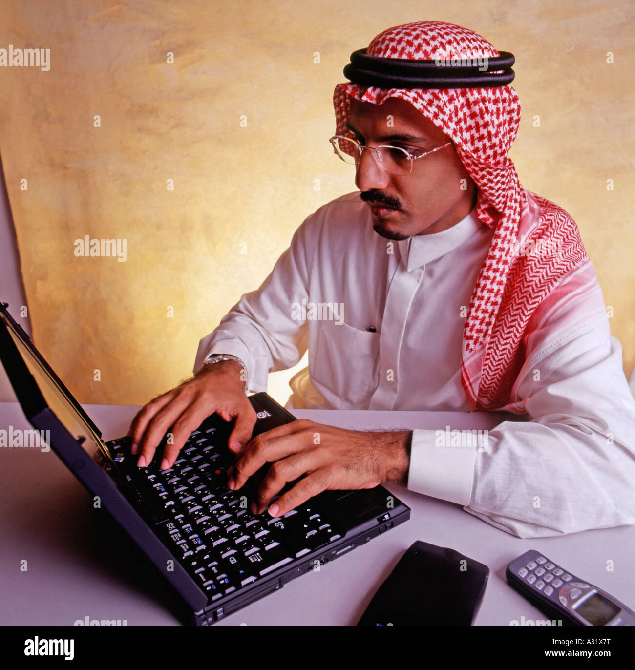 Saudi arab man computer office hi-res stock photography and images - Alamy