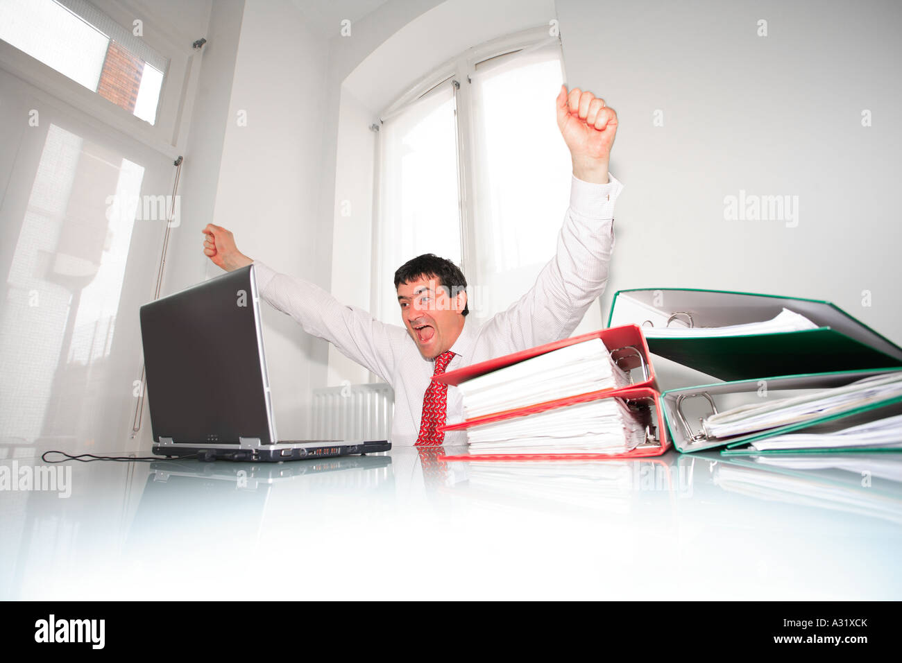 Businessman receives good news Stock Photo - Alamy