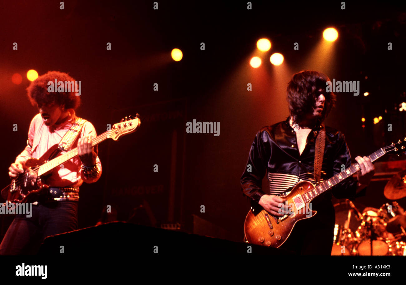 THIN LIZZY- UK rock group with Phil Lynott at left and Scott Gorham ...