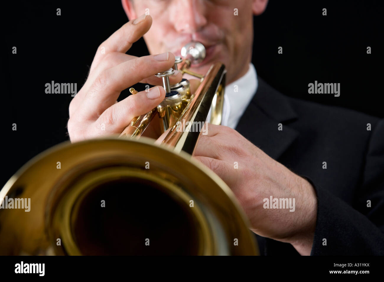 Man blowing trumpet hi-res stock photography and images - Alamy