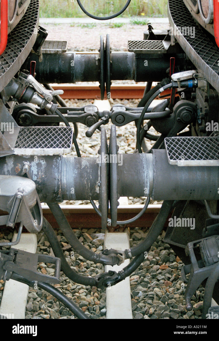 Connection between train carriages Stock Photo - Alamy