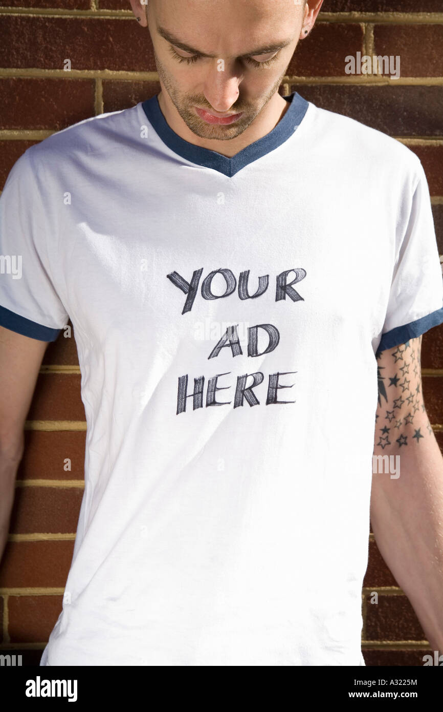 Man wearing a t shirt with handwritten text Stock Photo - Alamy