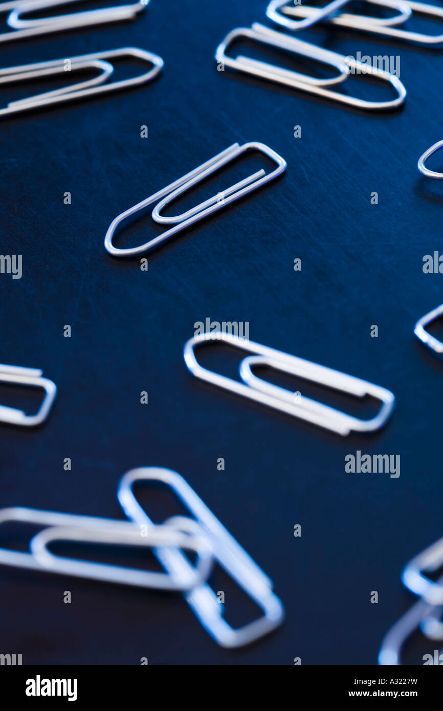 Group of paper clips on a desk Stock Photo - Alamy