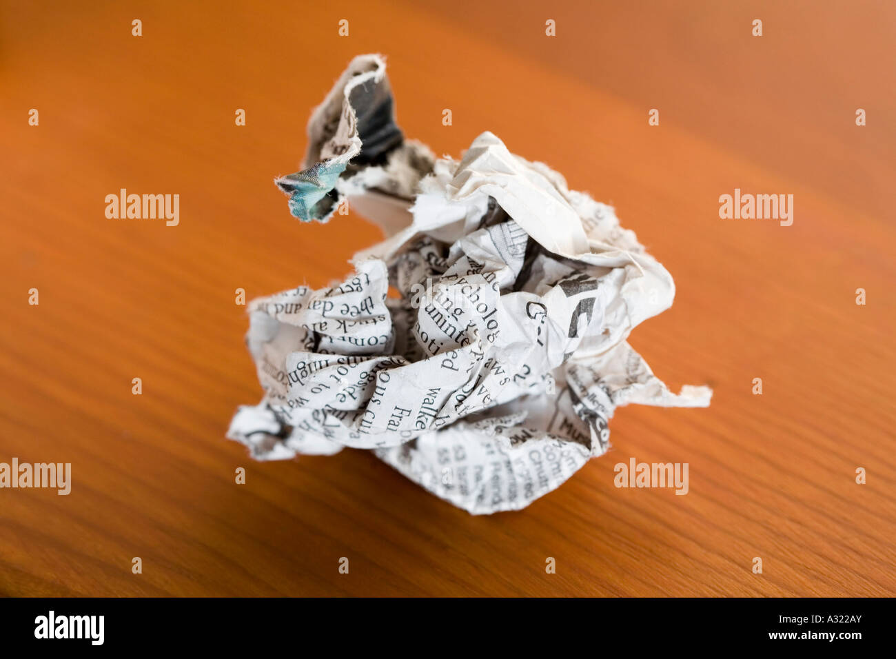 Crumpled newspaper on a table Stock Photo - Alamy