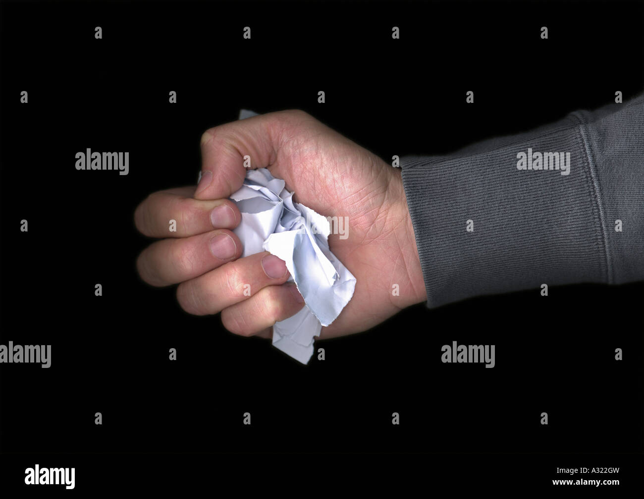 Man holding crumpled paper Stock Photo - Alamy