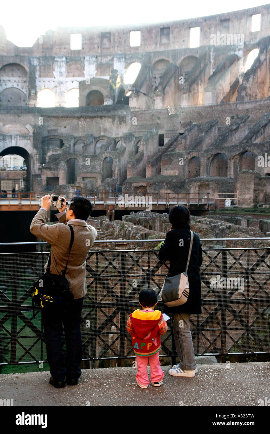 Tourists sightseeing in the arena of the Colosseum Rome Italy Stock ...