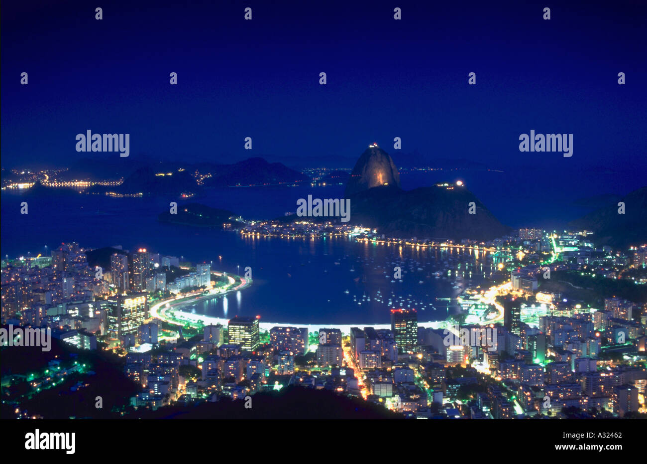 Aerial view of Rio de Janeiro with city lights at night Brazil Sugar ...