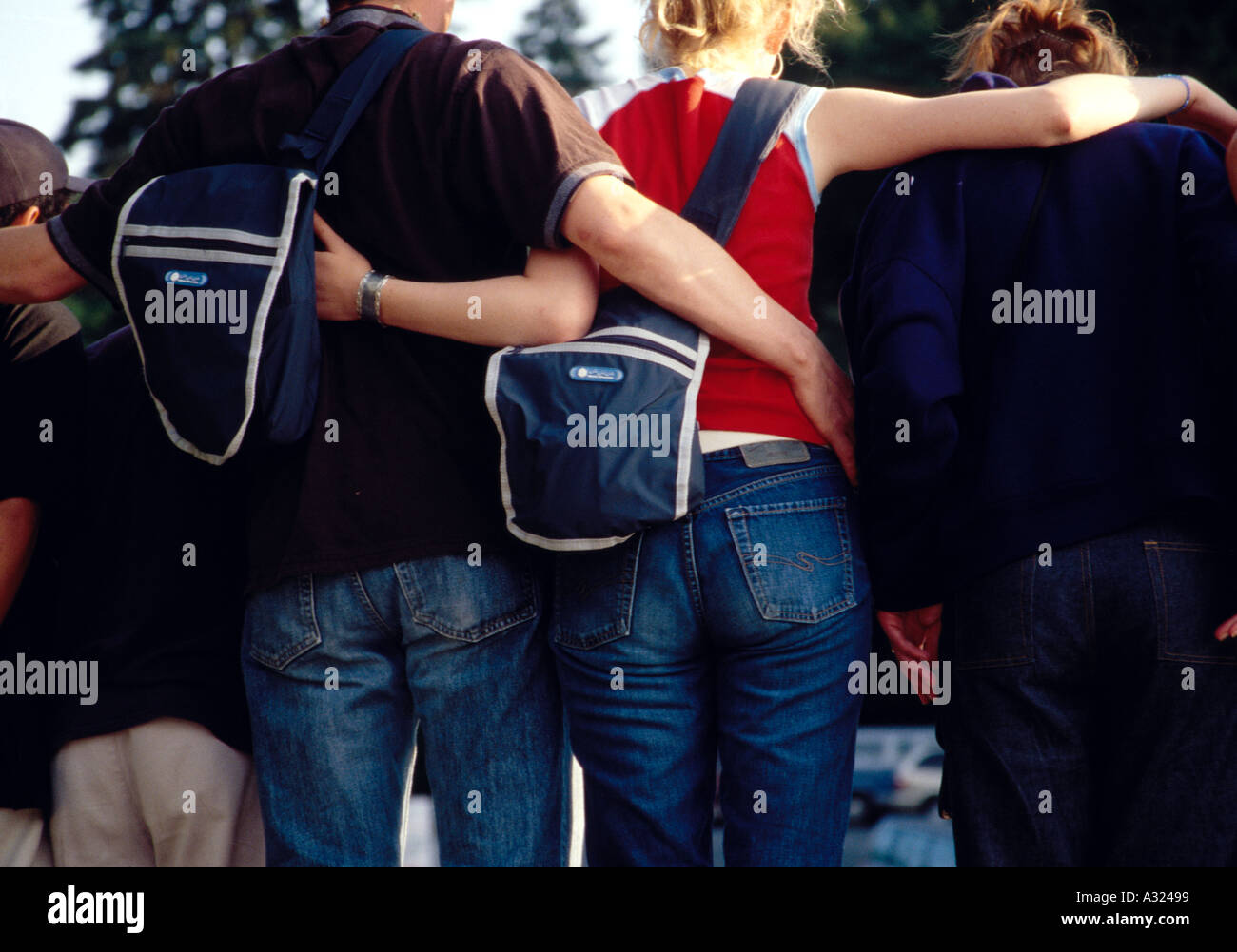Girl friends walking arm in hi-res stock photography and images - Alamy