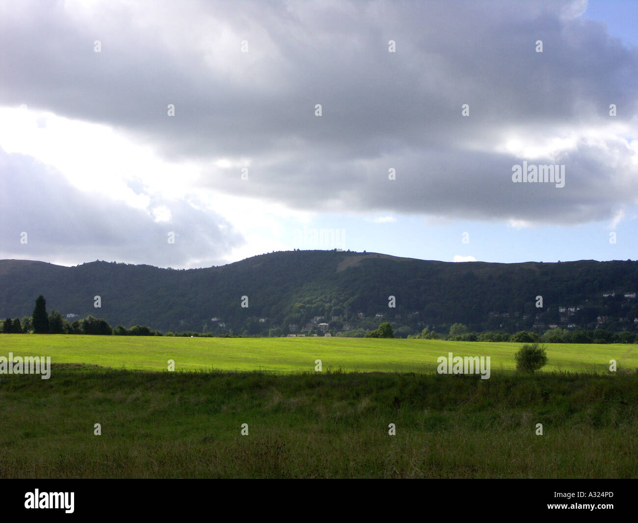 View of Malvern and the hills with grassland on the common in the ...