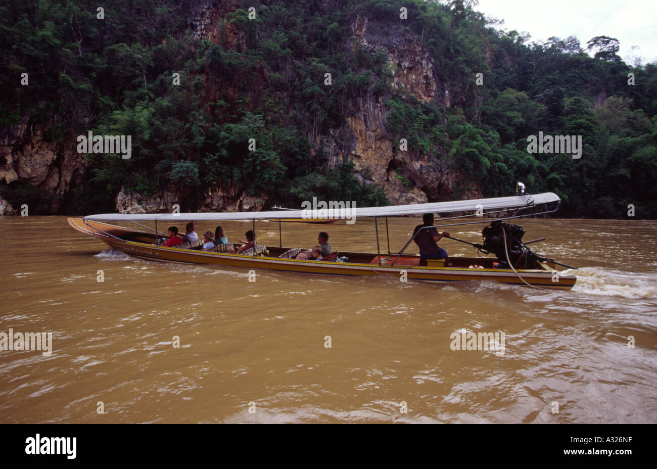 Thai long speed boat for transportation up river to resort hotel ...