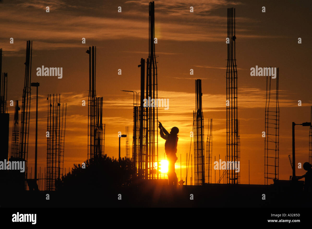 construction worker tying re bar for vertical support column Stock ...