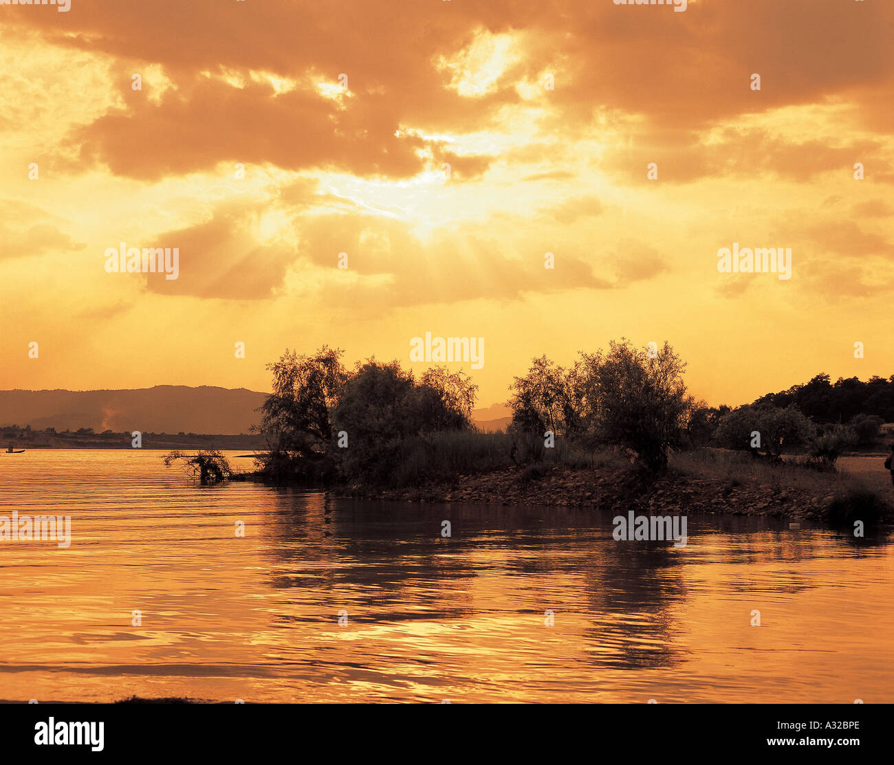 The sundown blazing down the lakeside Stock Photo - Alamy