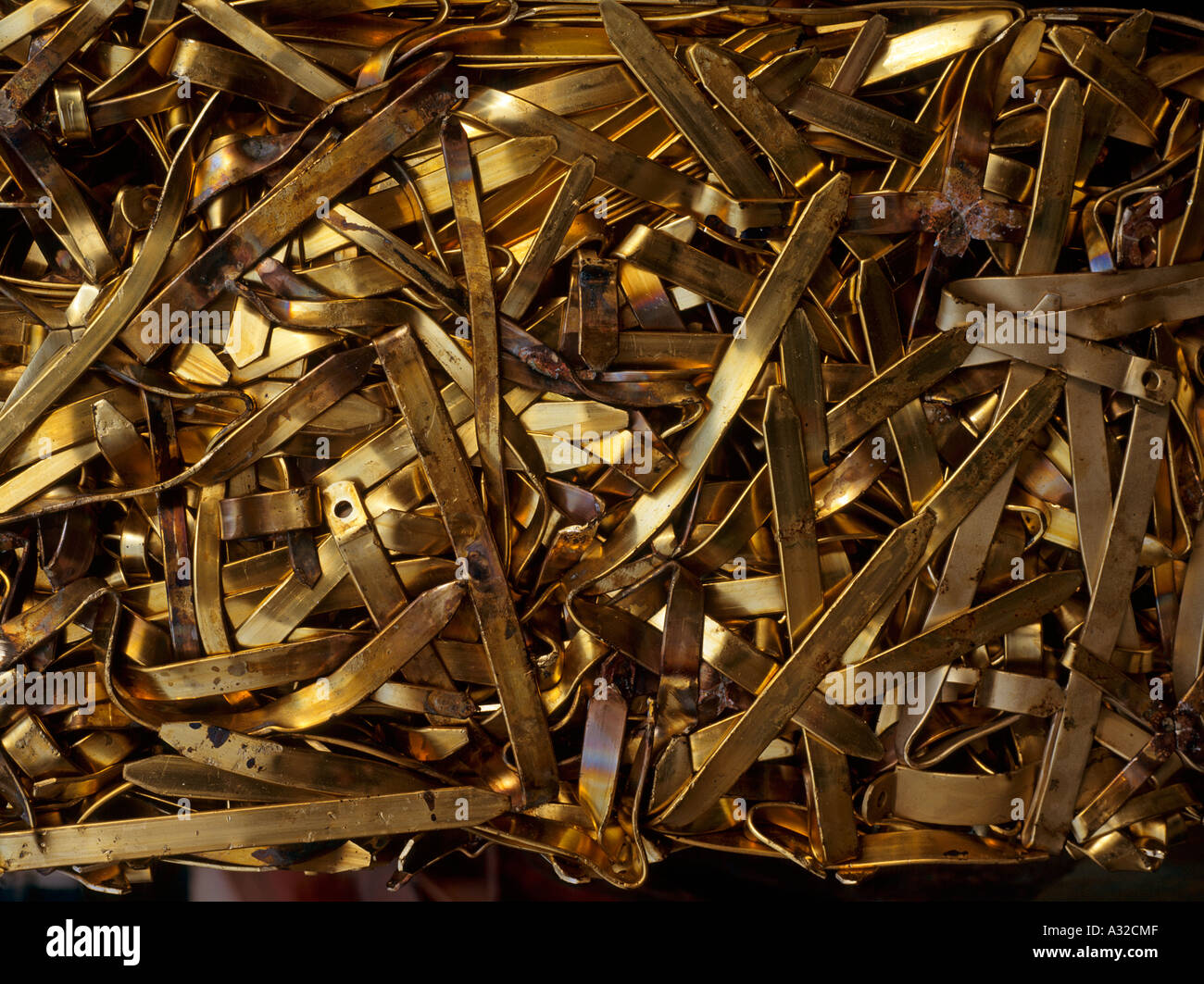 Bronze metal compressed prior to recycling North Wales UK Stock Photo ...