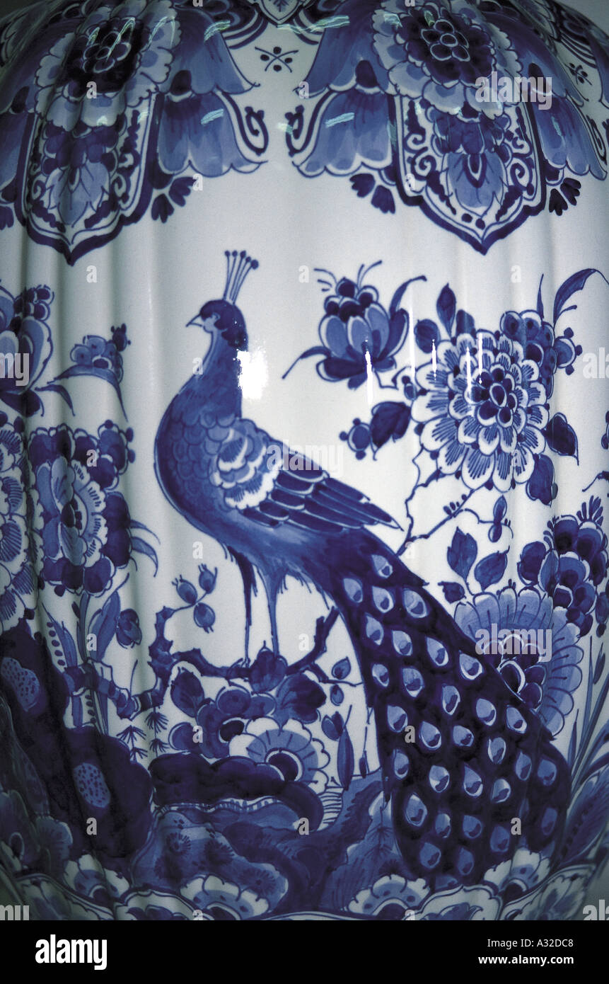 Hand painted peacock on a Delft blue plate, Holland Stock Photo - Alamy