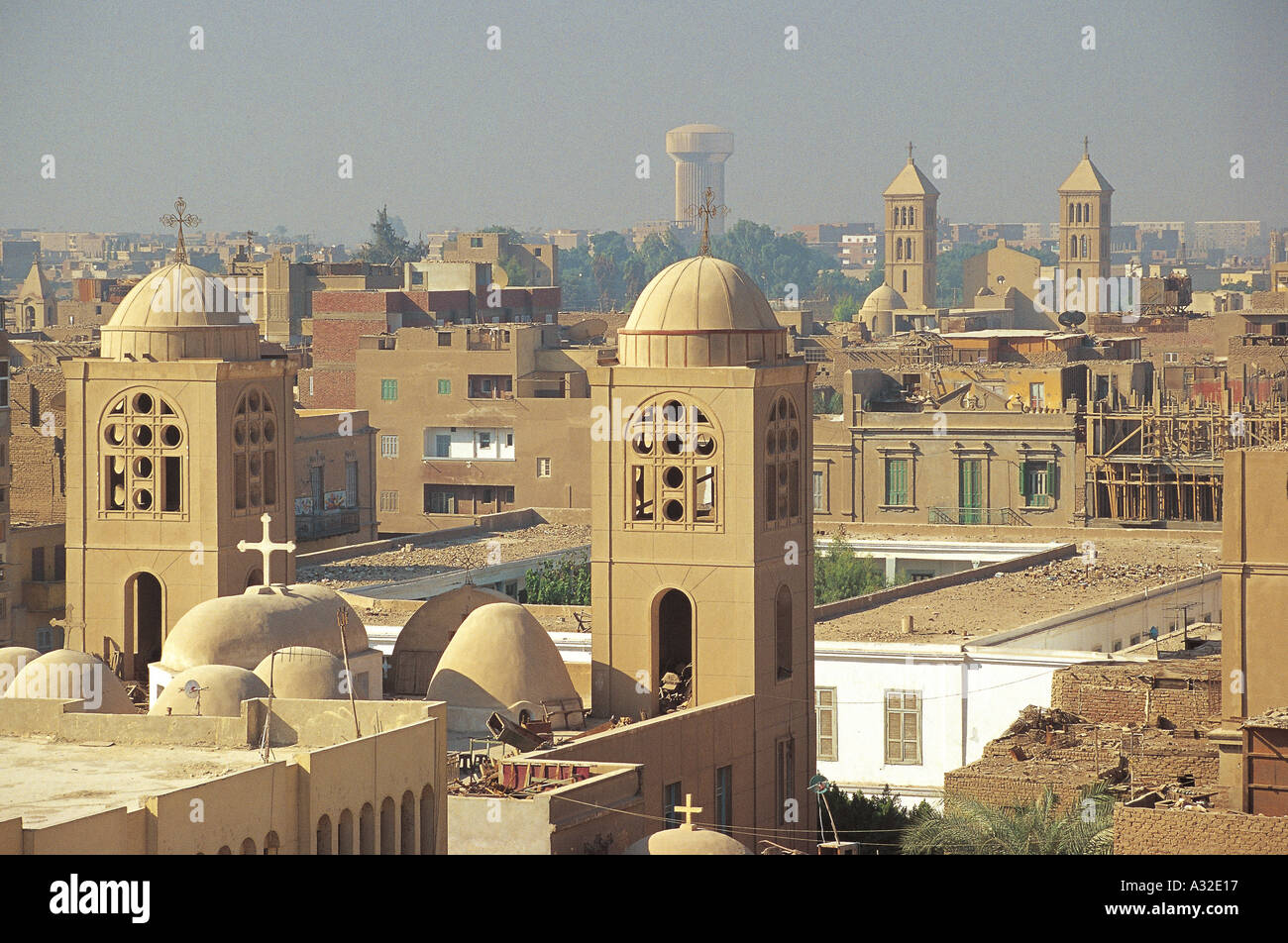 Skyline of Minya, market town in Middle Egypt with church spires and ...