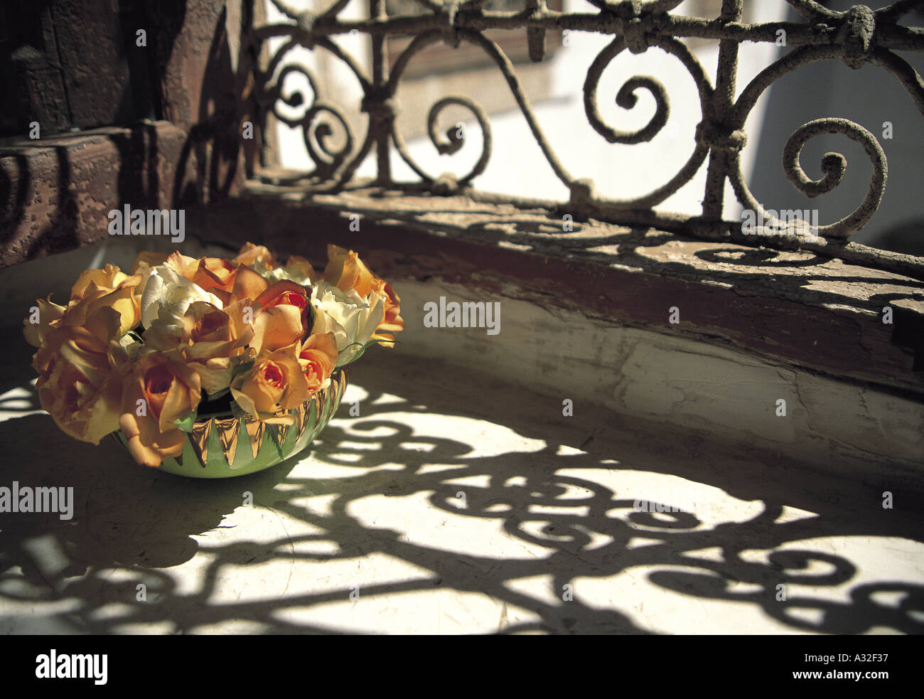 Window Grill with bowl of flowers, Moroccan design Stock Photo - Alamy