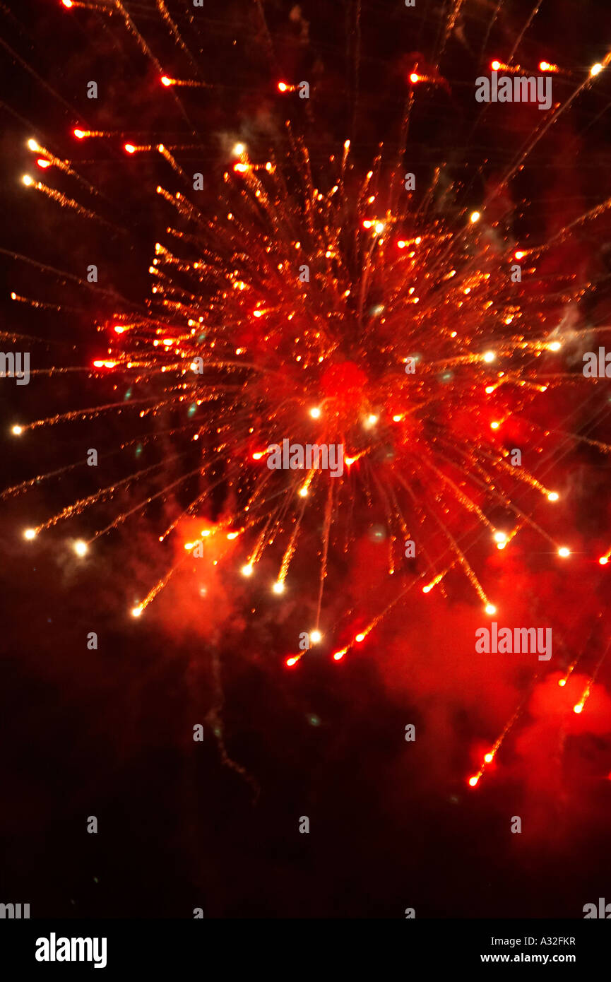 Red and white explosions from fireworks Stock Photo - Alamy