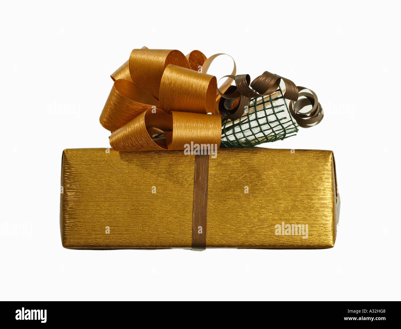 Gift wrapped parcel gold wrapping hi-res stock photography and images ...