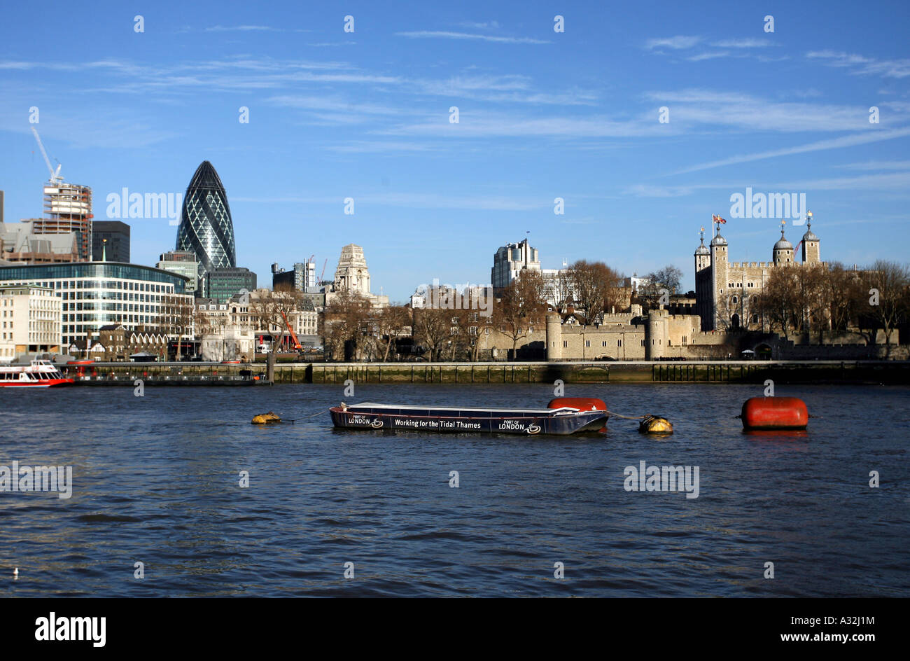 The Tower of London turrets and the Gherkin Skyscraper as seen from the ...