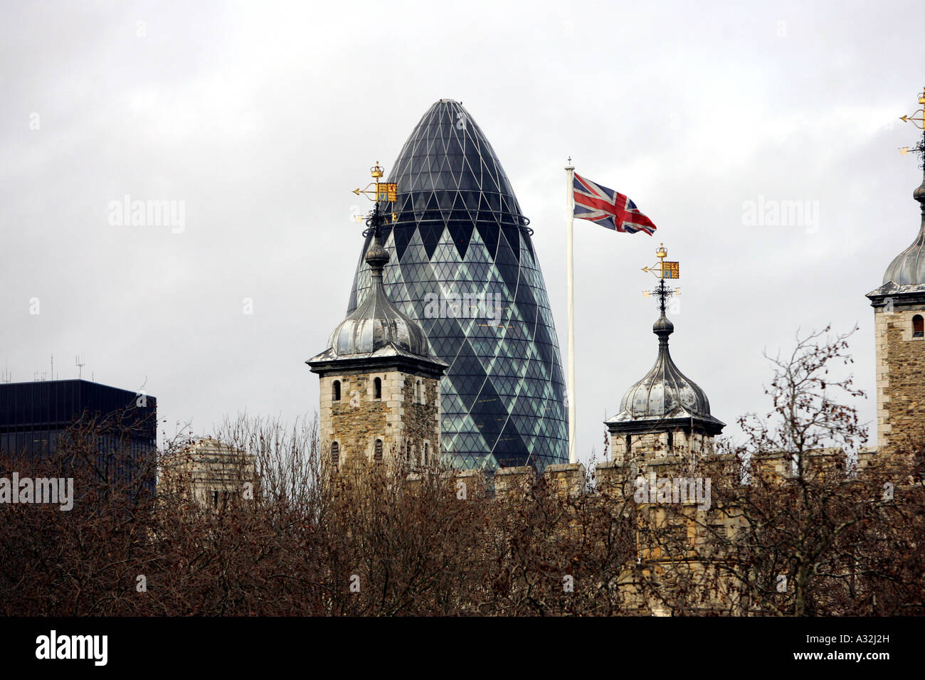 The Tower of London turrets and the Gherkin Skyscraper central London ...
