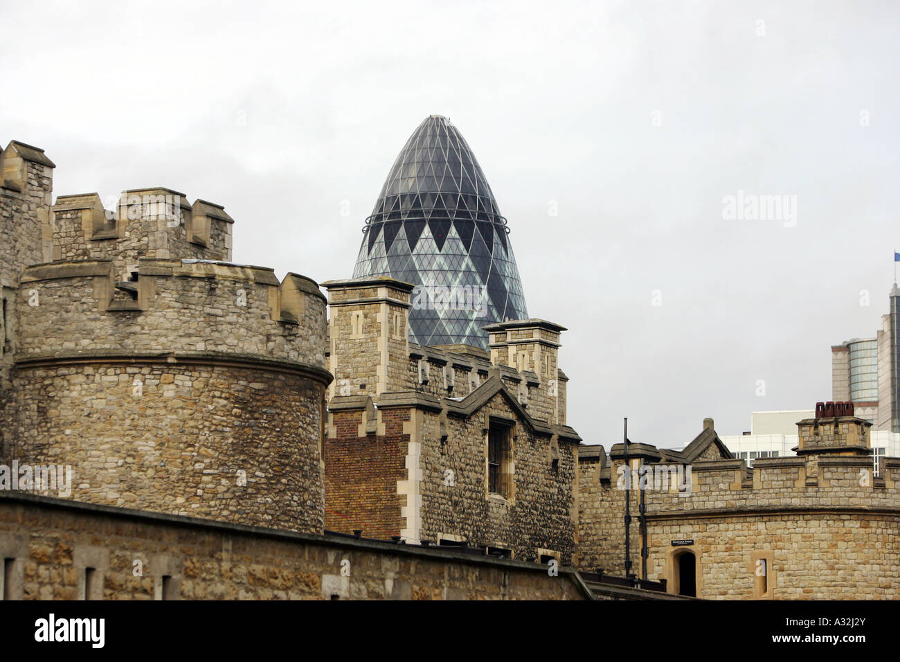 The Tower of London turrets and the Gherkin Skyscraper central London ...