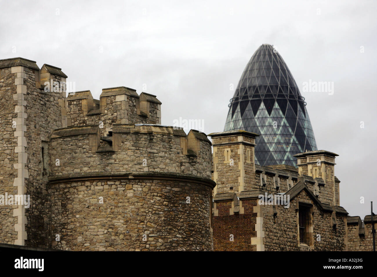 The Tower of London turrets and the Gherkin Skyscraper central London ...