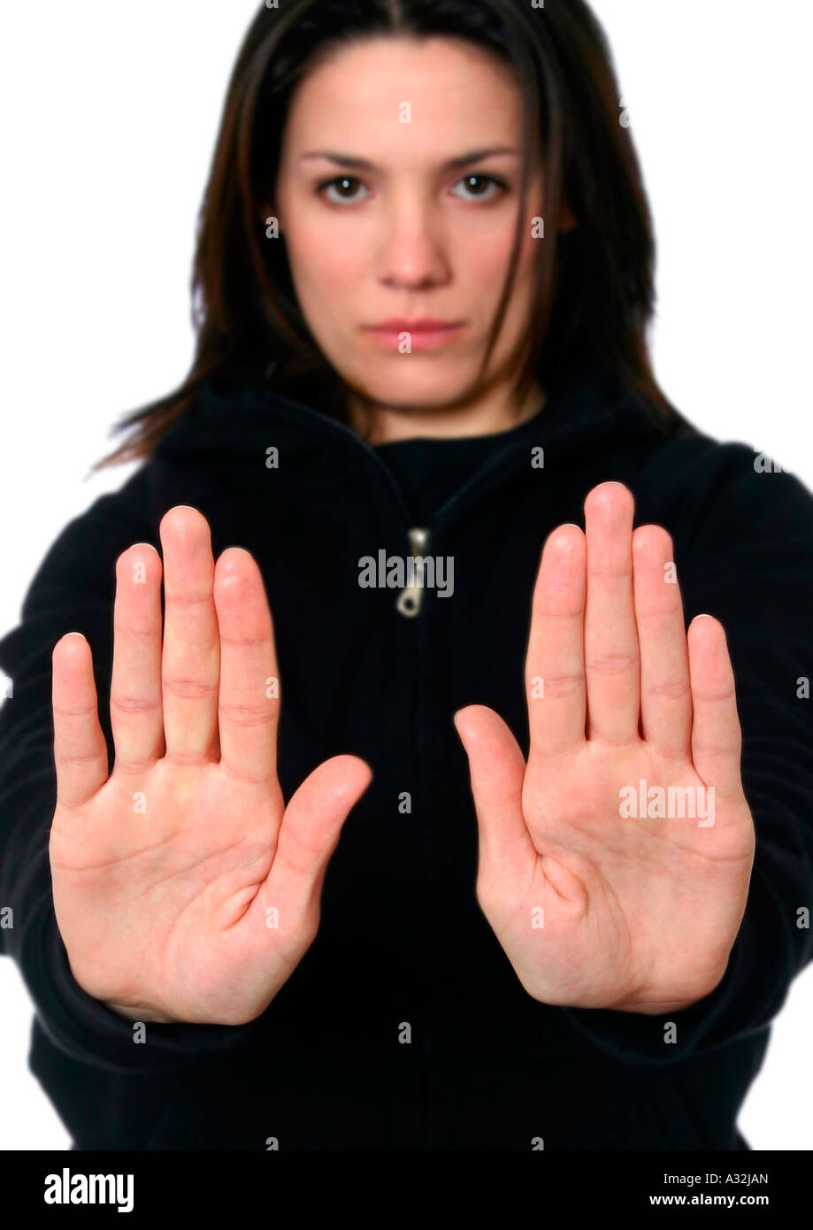 young woman with her hand raised Stock Photo - Alamy