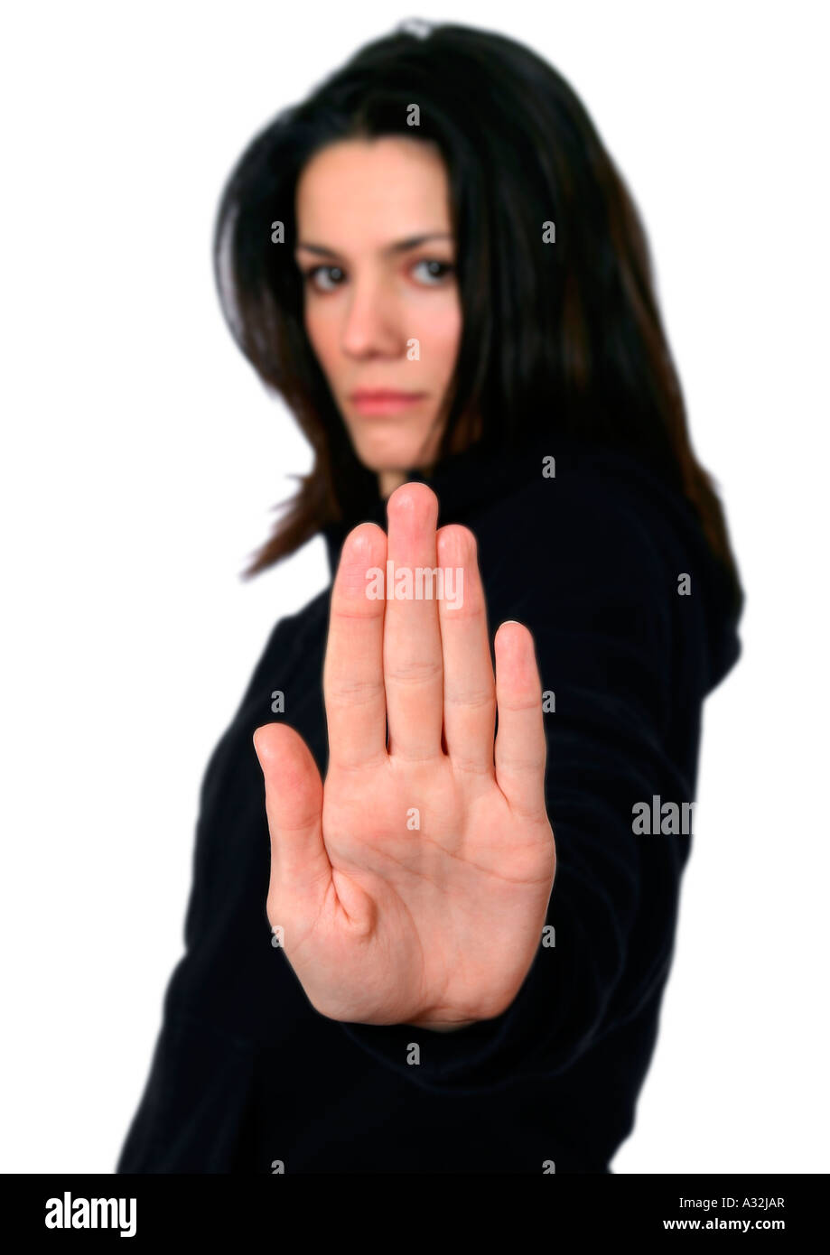 young woman with her hand raised Stock Photo - Alamy