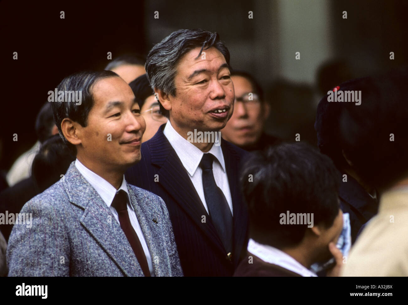 Businessmen in the street of Tokyo Japan Stock Photo - Alamy