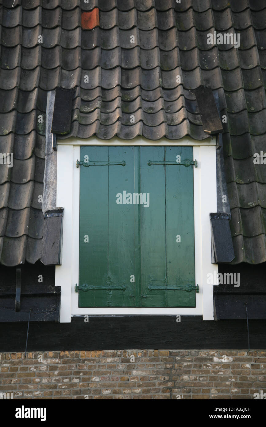 Window with shutter of one of the windmills of the Unesco World ...