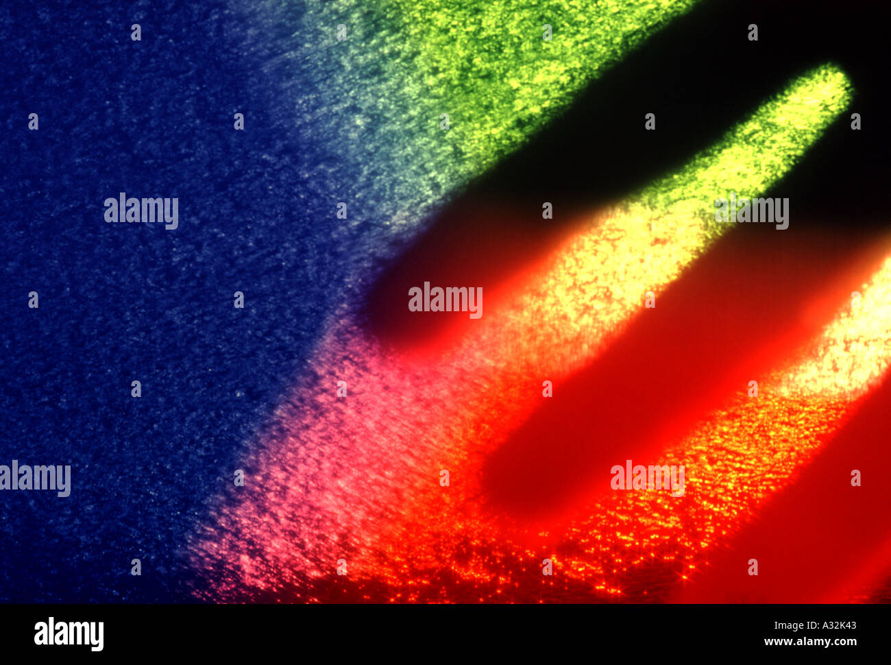 SILOHETTE OF A HAND OVER A MULTI COLOURED BACKGROUND Stock Photo - Alamy