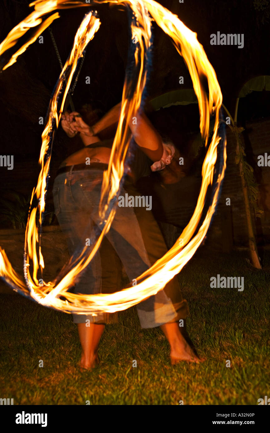 MEXICO San Miguel de Allende Woman fire dancing using poi circles of ...