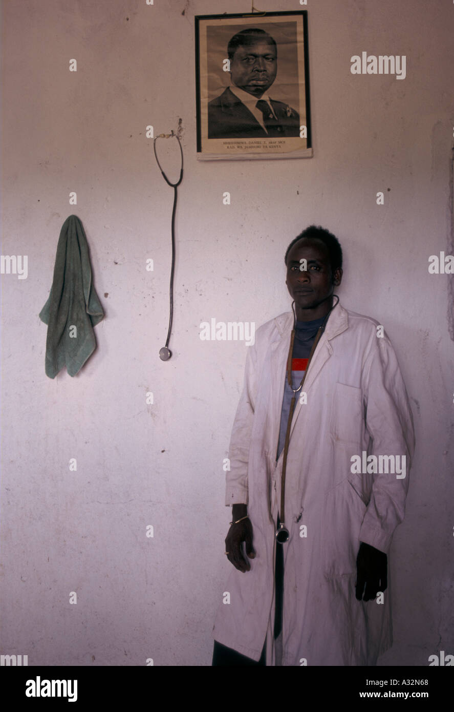 samburu tribe health clinic doctor posing under a portrait of president ...