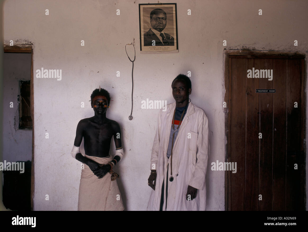samburu tribe health clinic doctor and man posing under a portrait of ...