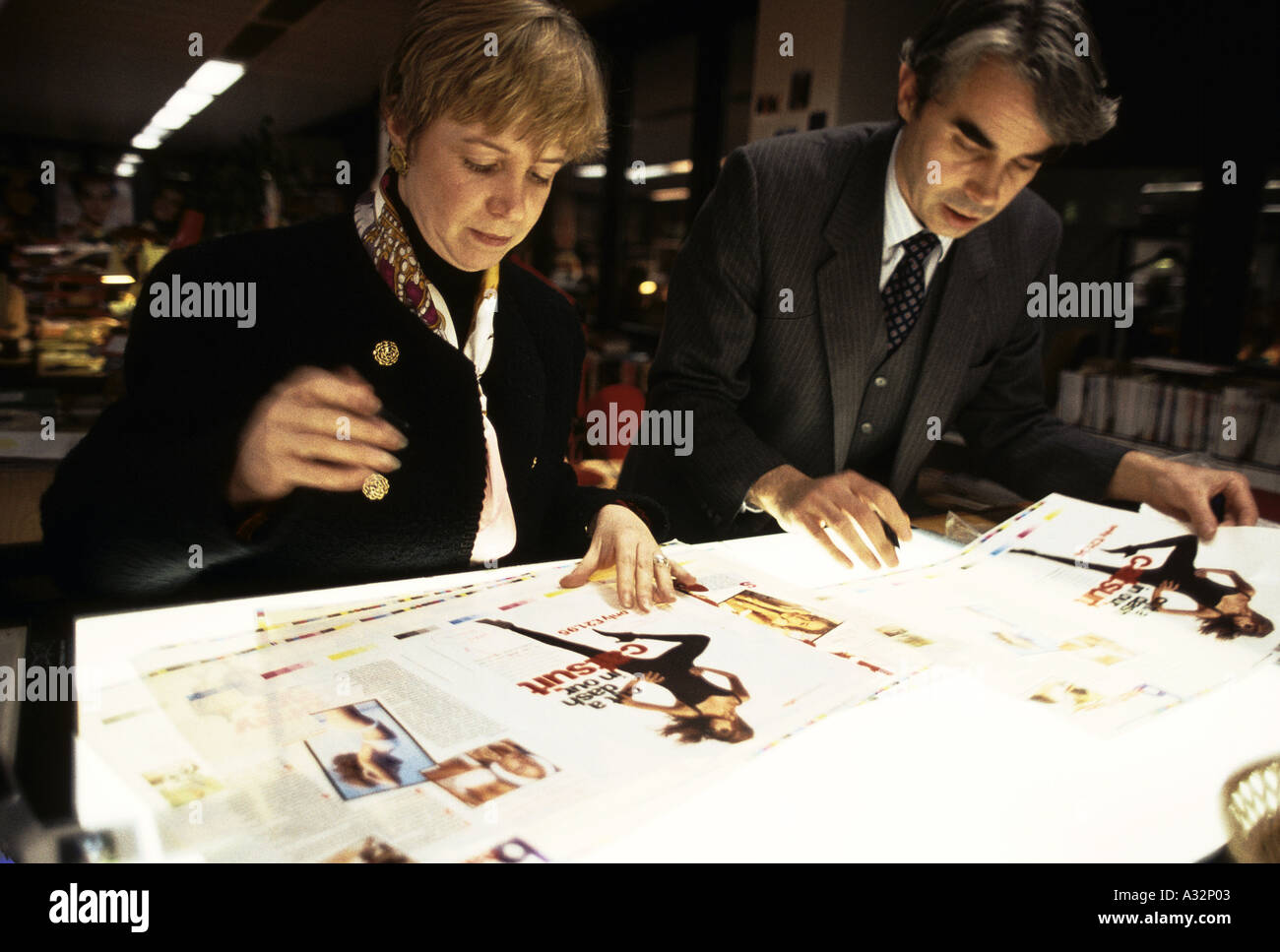 cosmopolitan magazine art director putting together layout in the west ...