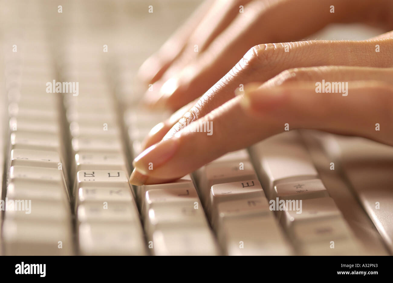 two hands typing keyboards Stock Photo - Alamy