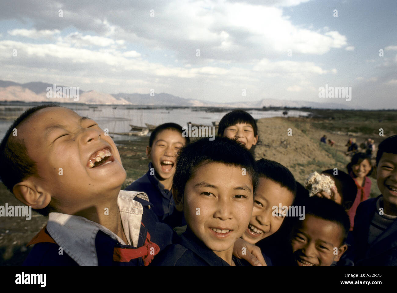 a day in the life of china a group of young boys laugh while playing by ...