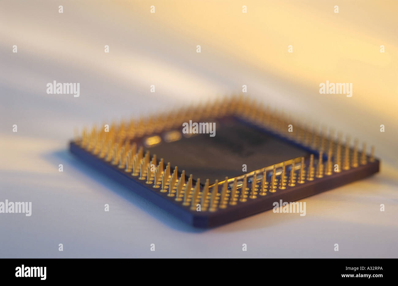 A computer chip on a clean surface Stock Photo - Alamy